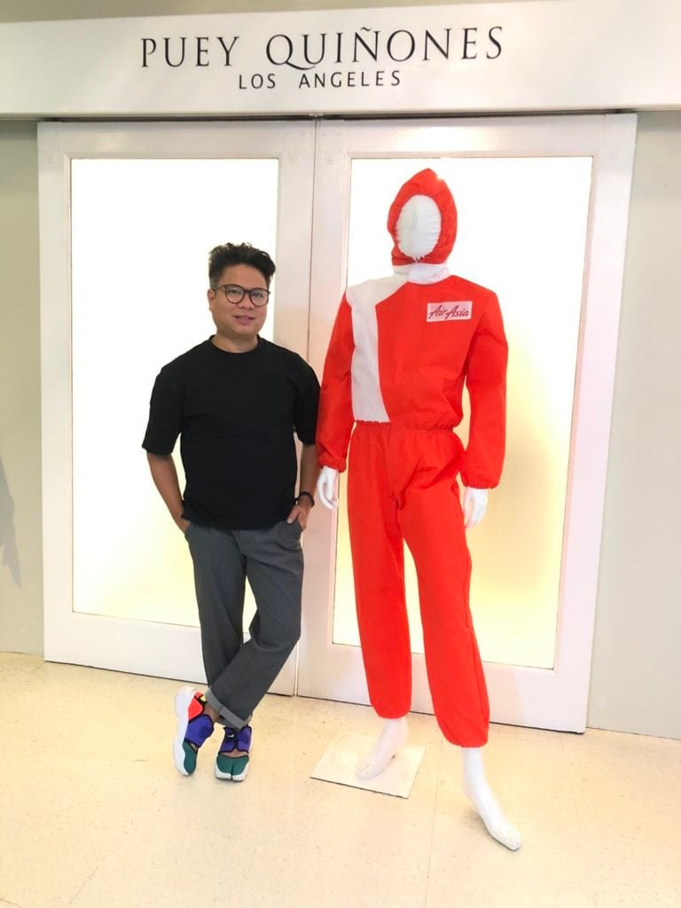 Air Asia Reveals Signature Red PPE Suits For The Safety Of Their Cabin ...