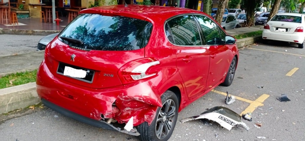 M'sian Asks For Public's Help To Identify Car That Hit His Car Severely ...