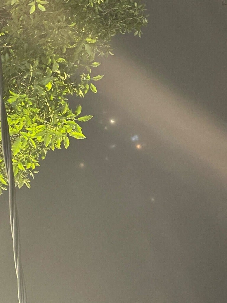 "UFOs or reflection from building?" - Cluster of Colourful Lights in ...