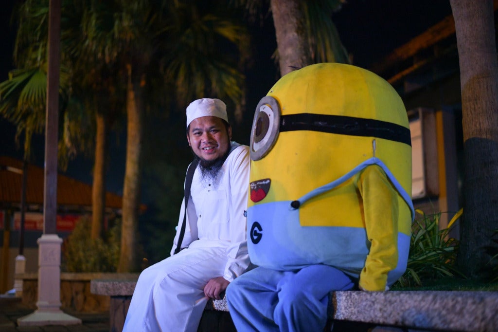 Ustaz Ebit Lew Gifts Motorbike to a 19yo Who Dresses as a Minion To ...