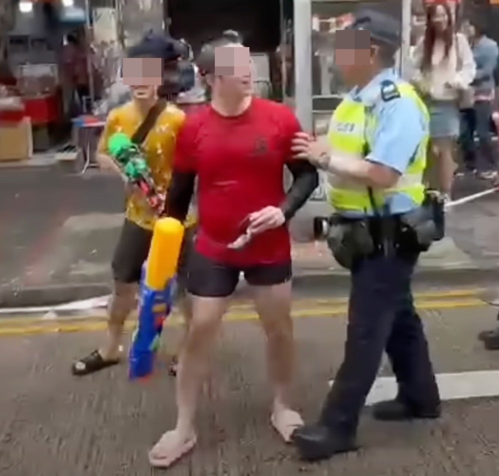 WATCH: HK YouTuber Fires Water Gun at Police During Songkran Festival ...
