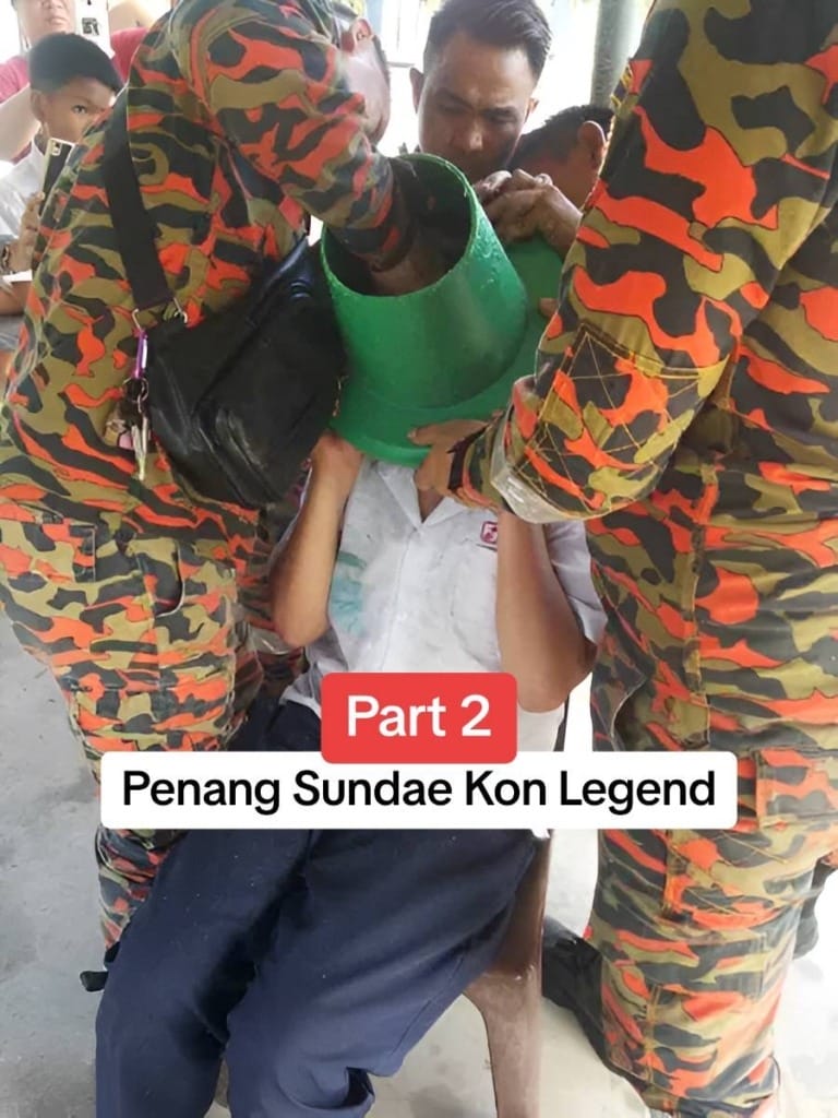 Abang Bomba Saves Penang School Kid After His Head Got Stuck in a Cone ...