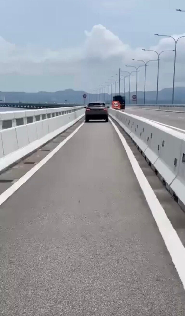 PDRM Arrests 70yo M'sian Woman for Driving Proton X50 on The Motorcycle ...