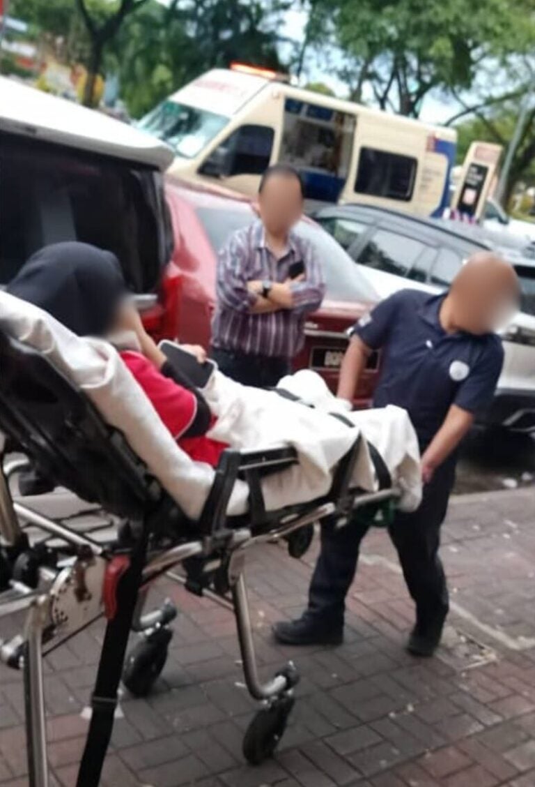 23yo Female Staff Gets Bitten by 2-Metre-Long Python While Using ...