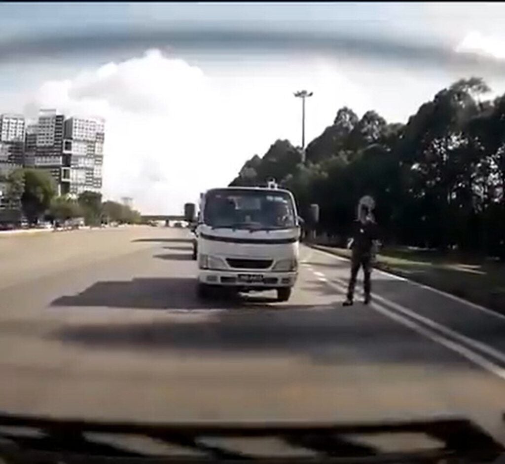 Pedestrian Hit After Accidentally Walking Into Motorcycle Lane Near ...